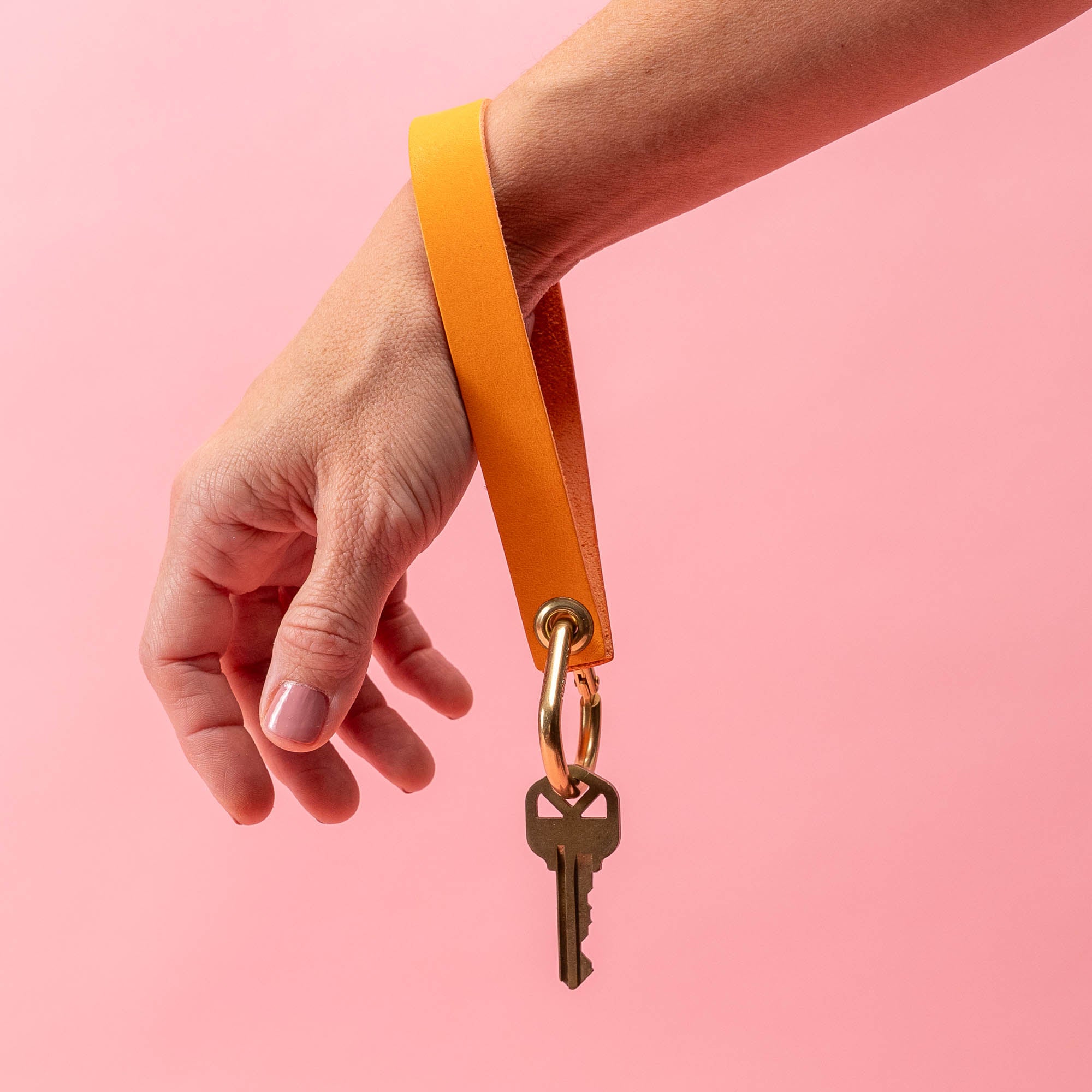 Handcrafted Leather Wristlet in Tangerine | Avryn Co.
